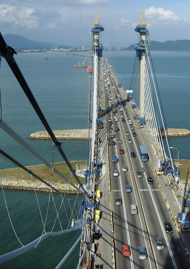 Post-tensioning strand systems for buildings